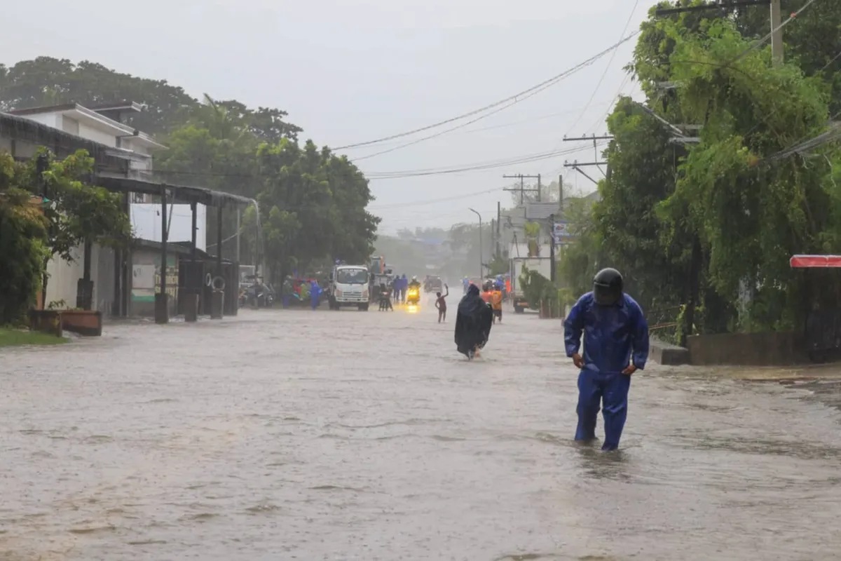 PHOTO: Julian brings heavy rains, floods to Batac | ABS-CBN News