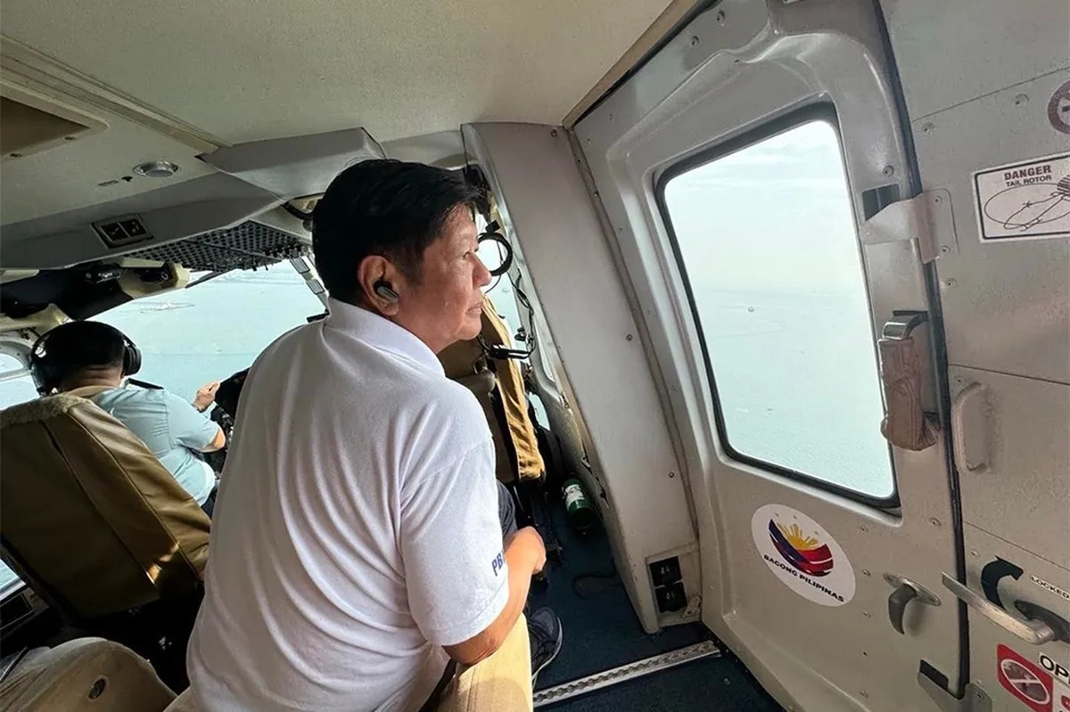 LOOK: Marcos leads aerial inspection of Bataan oil spill, Carina ...