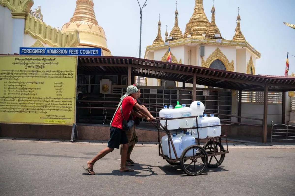 With motorbikes banned, Myanmar delivery riders struggle in heatwave ...