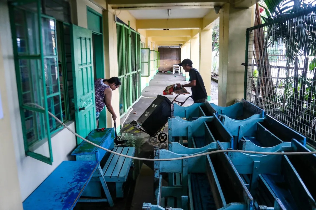 Rain-lashed schools clean up for start of classes on July 29 | ABS-CBN News