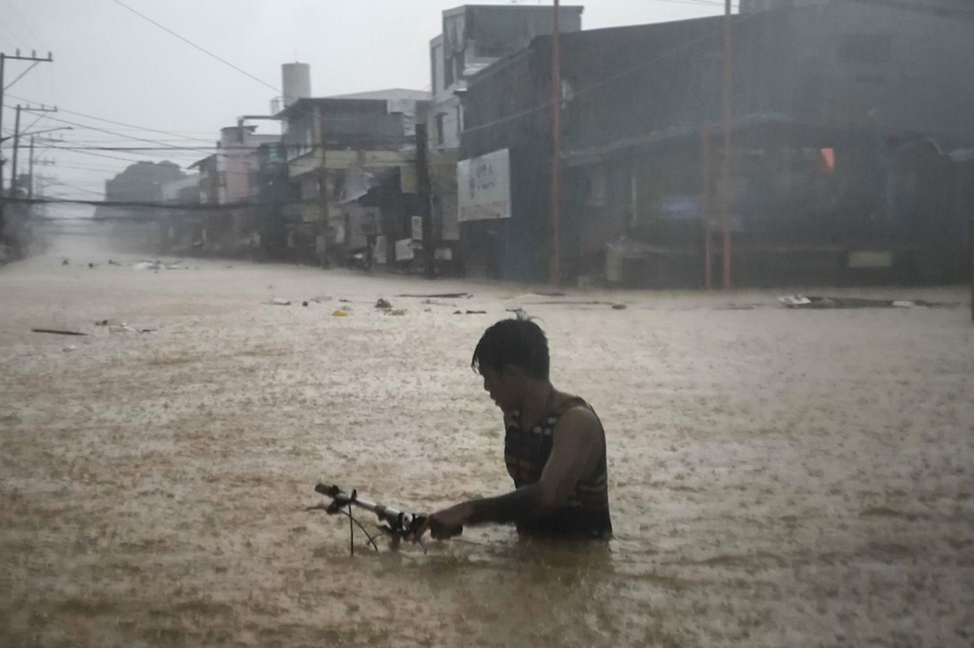 Residents rescued as Typhoon Carina causes floods in NCR | ABS-CBN News