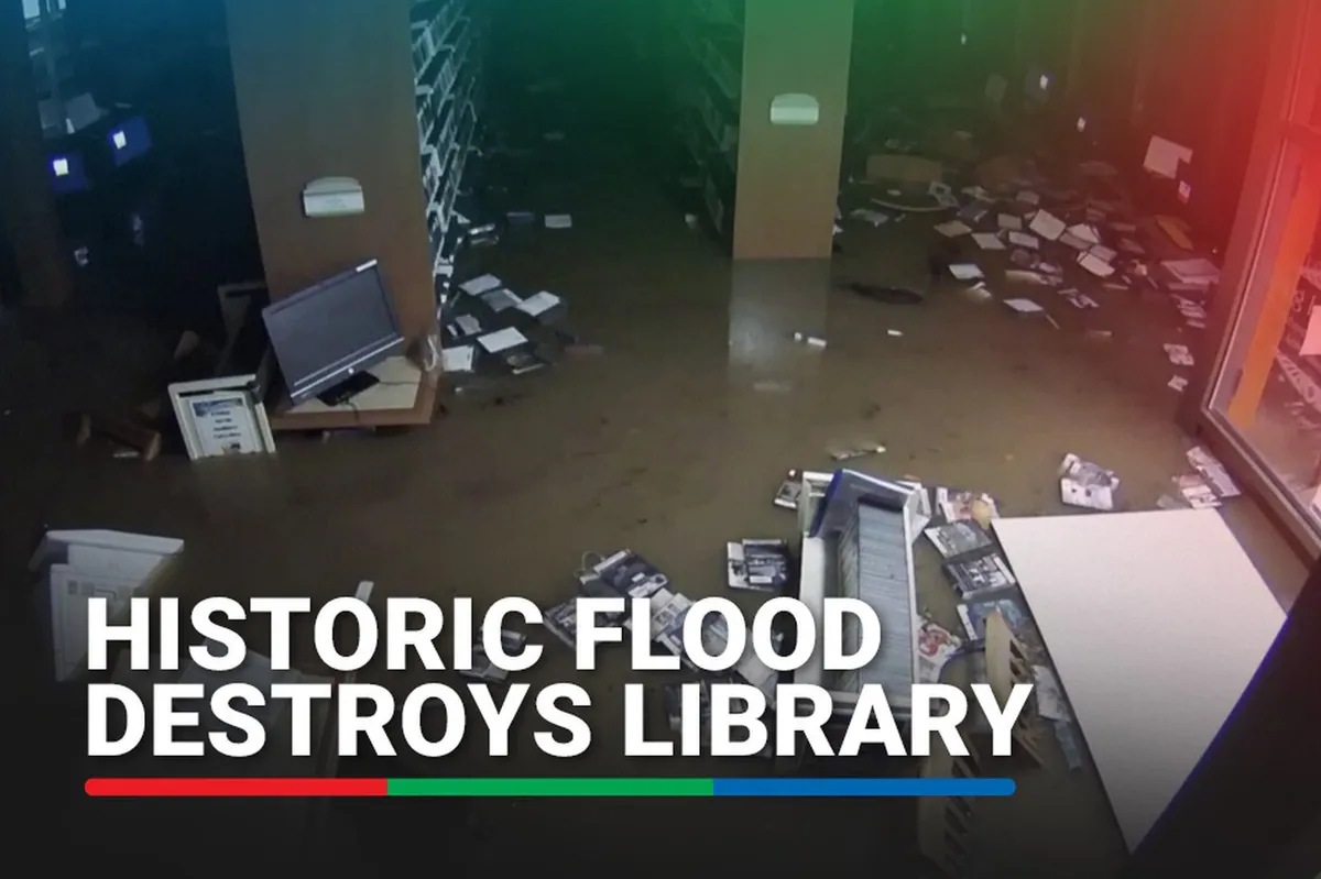 Flood breaks through library wall in NY, destroys thousands of books ...