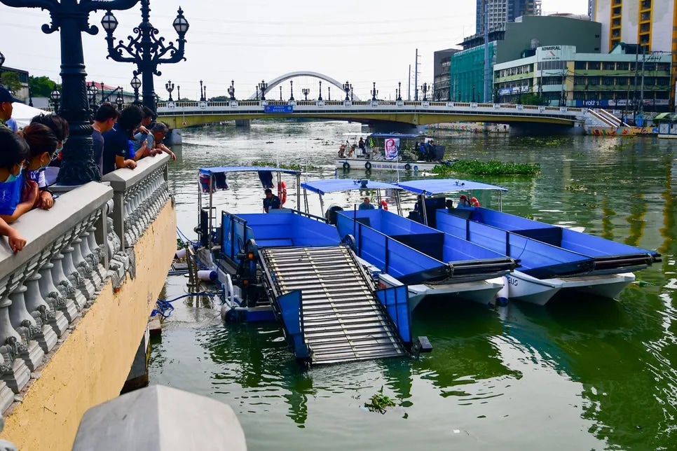 PHOTO: DOST launches floating solid waste collector system | ABS-CBN News