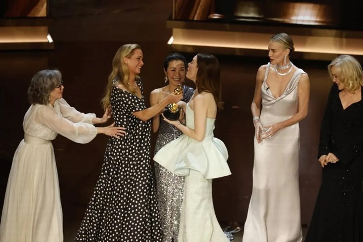 Oscar winners celebrate as they watch their name plates being placed on ...