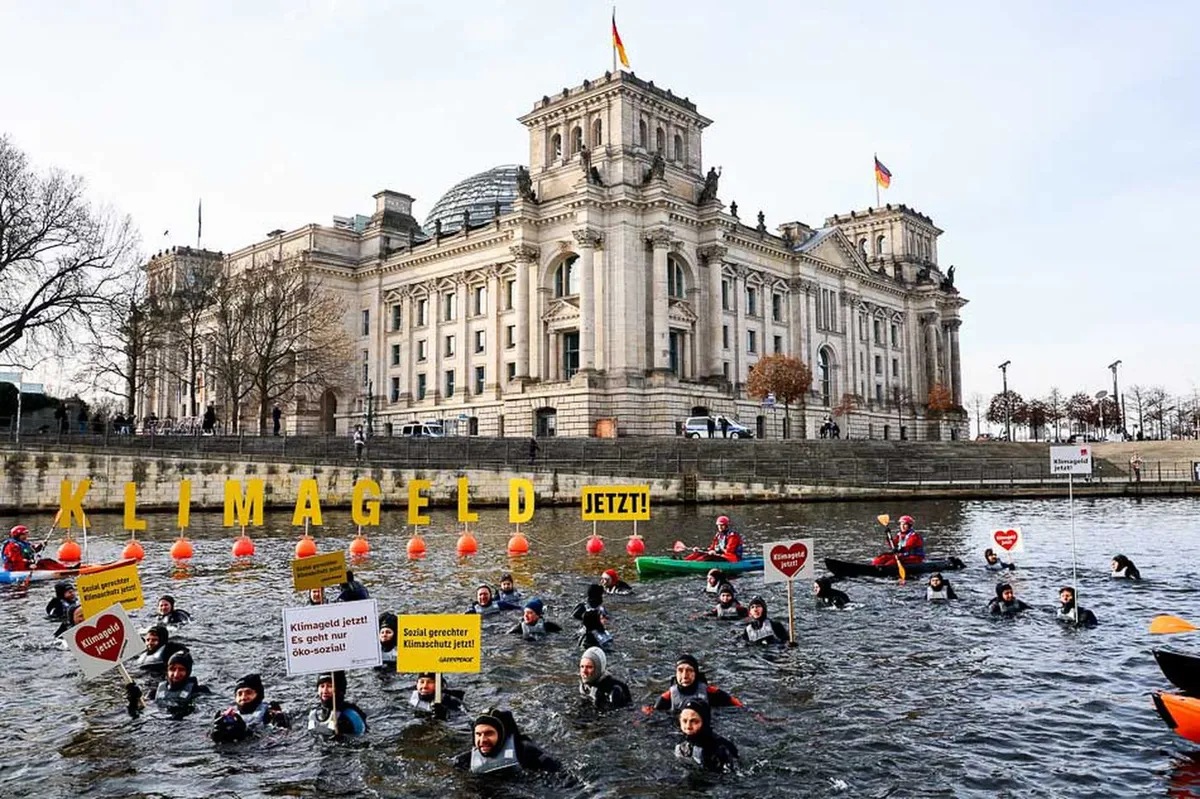 Activists swim for climate money | ABS-CBN