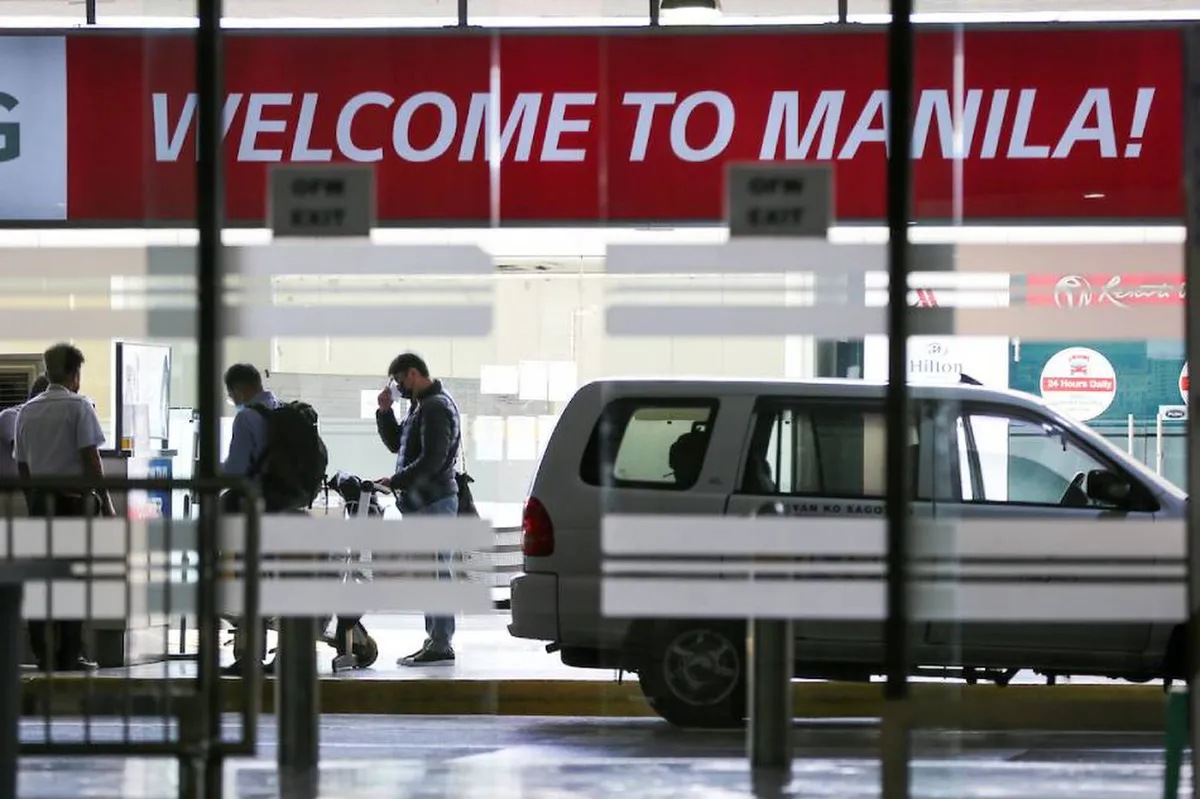 Immigration welcomes first e-visa holders | ABS-CBN News