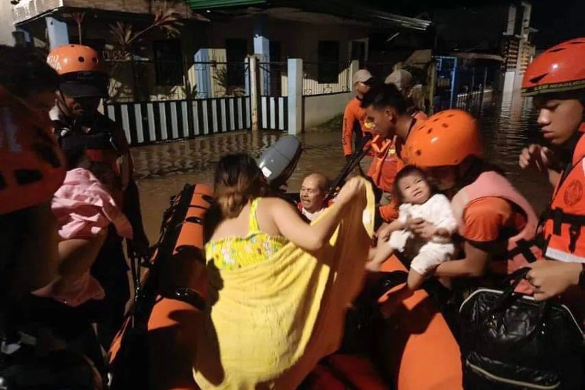 Davao flood victims rescued by Coast Guard | ABS-CBN News