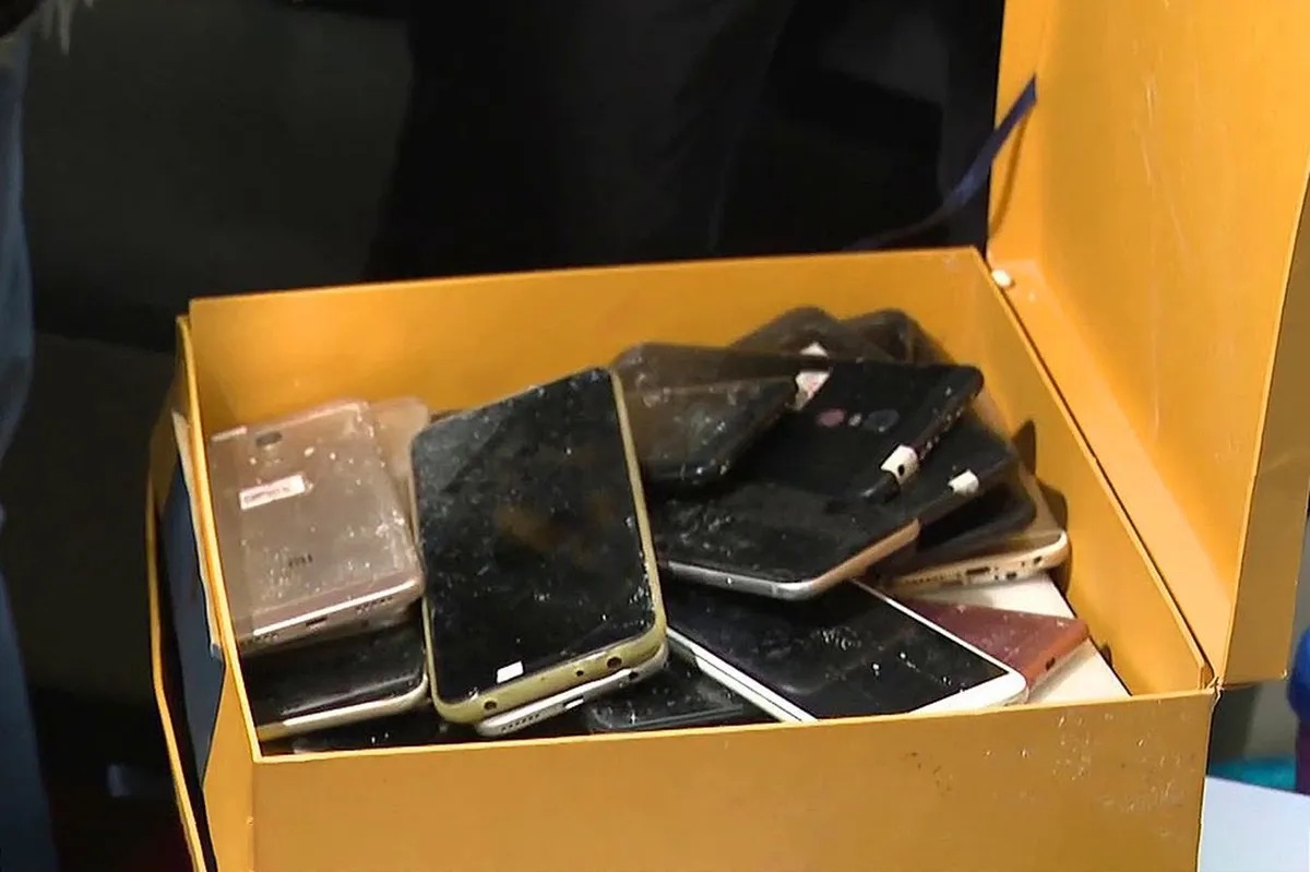 More cash, gadgets seized from POGO in Pasay | ABS-CBN News