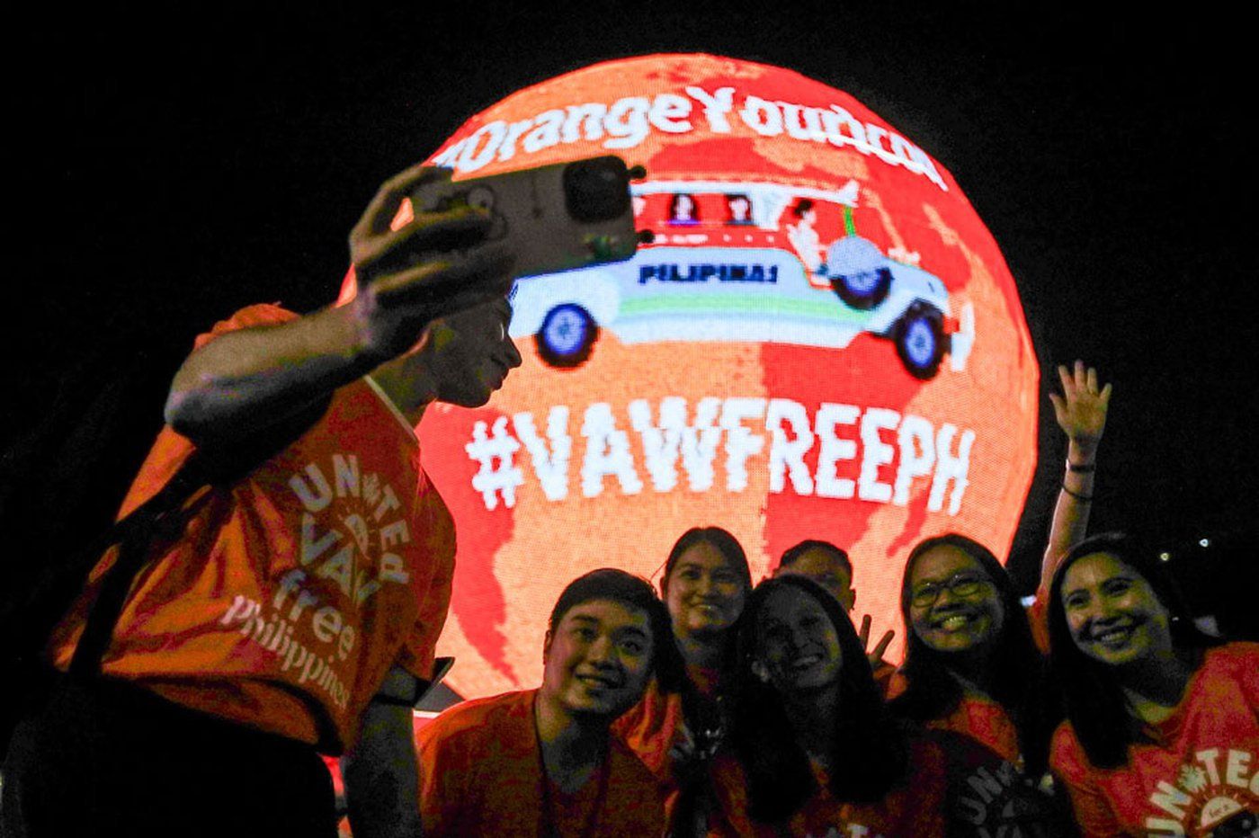 MOA globe lights up against VAW | ABS-CBN News