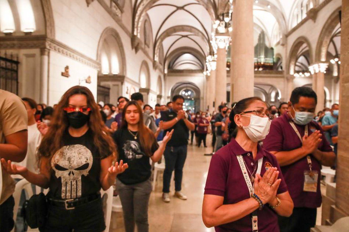 Raised or clasped hands? CBCP settles 'Our Father' posture debate | ABS-CBN