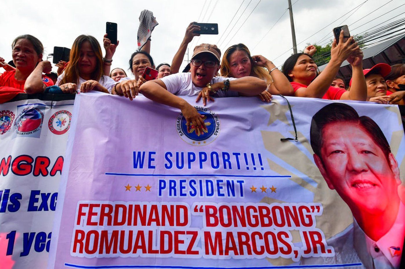 Supporters of President Marcos Jr. gather near Sandiganbayan for his ...