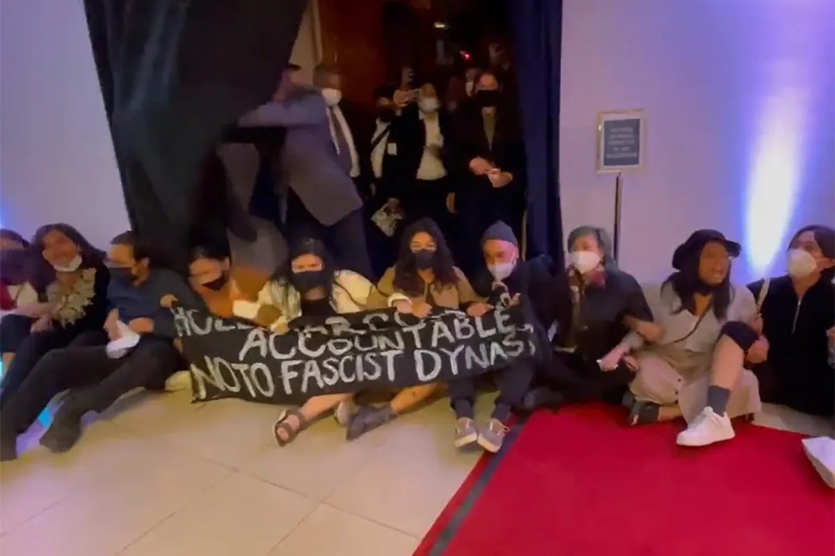 Critics stage protest, as Marcos speaks at Asia Society in New York ...