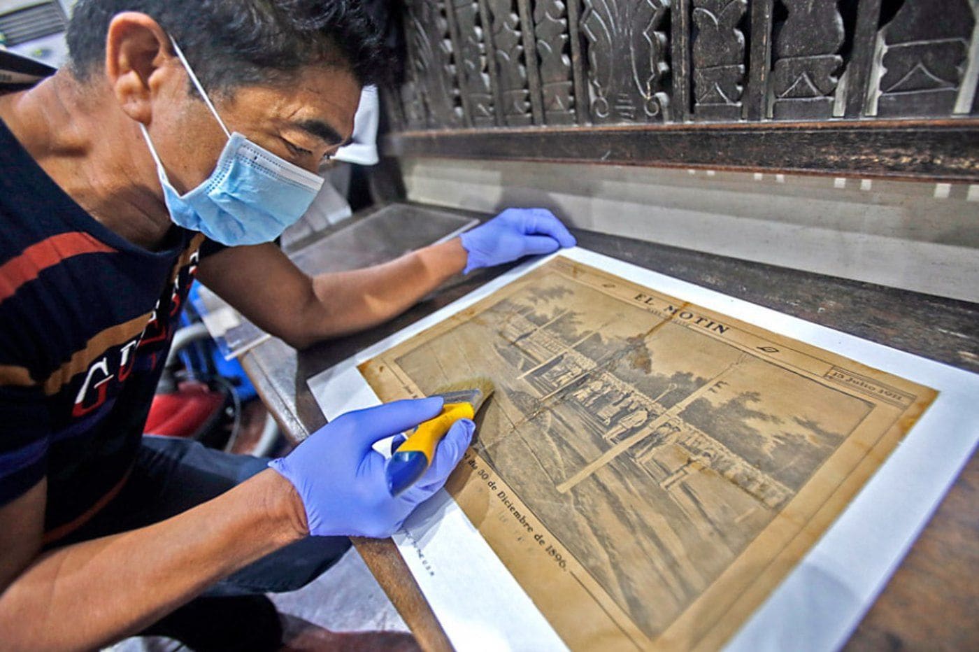 Caring for 111-year old newspaper with illustration of Rizal execution ...