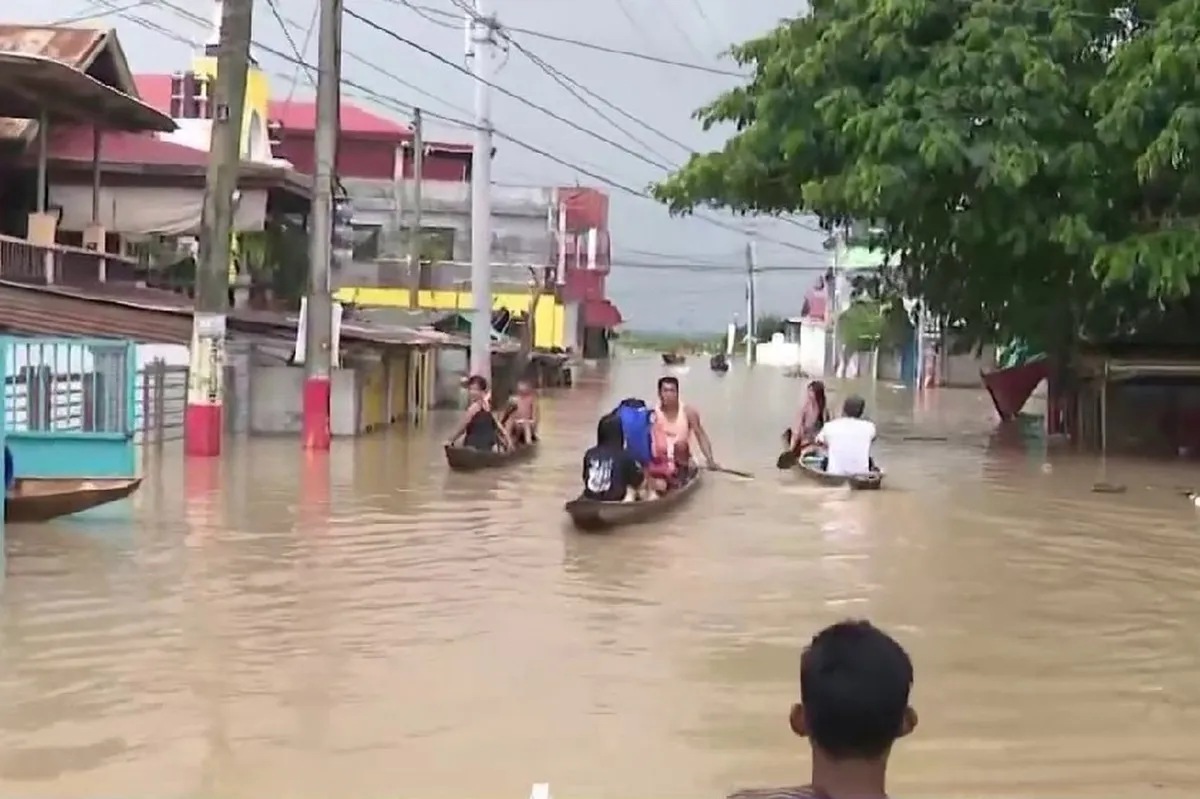 Fish overflowing but Candaba swamp still rising after Karding | ABS-CBN ...