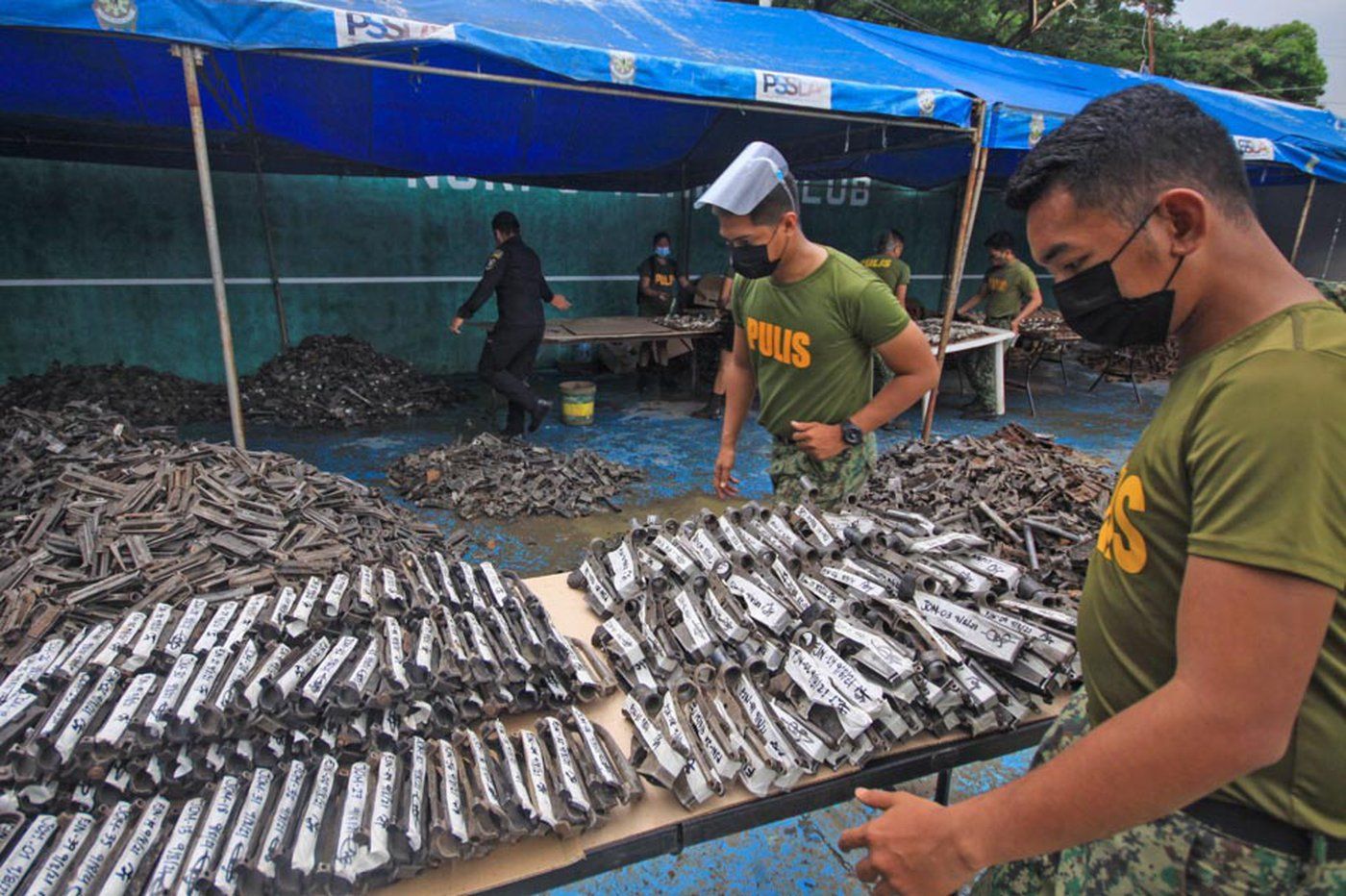 PNP seizes loose firearms and parts of high-powered weapons in QC and ...