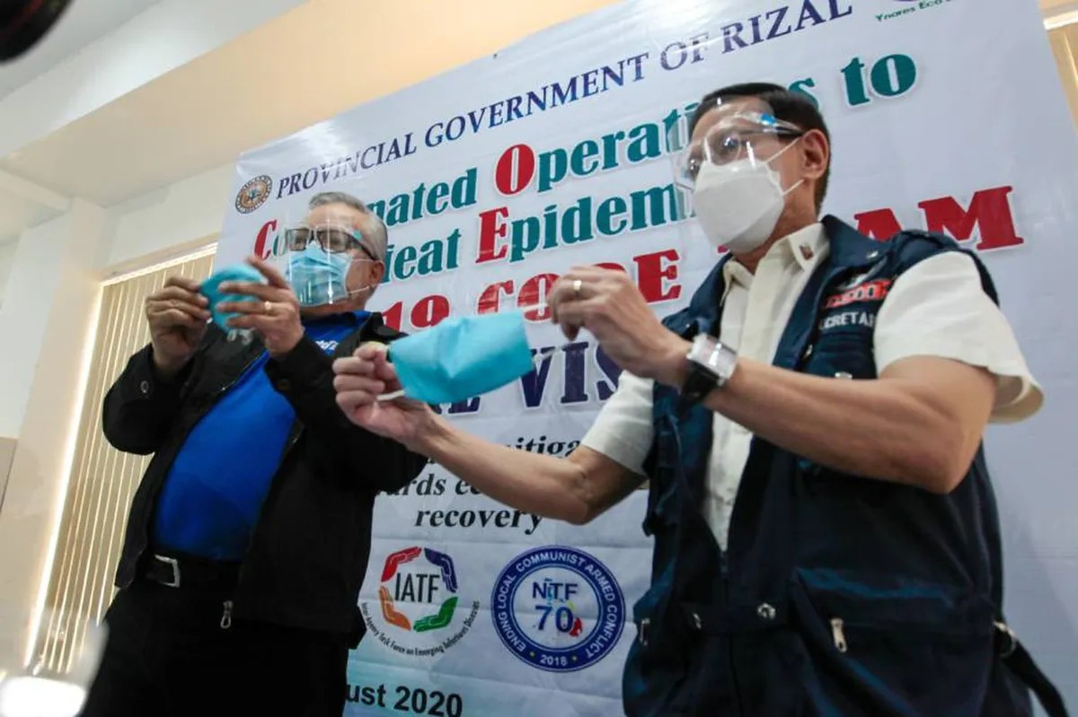 DTI donates 50,000 face masks to PNP for improper mask-wearing ...