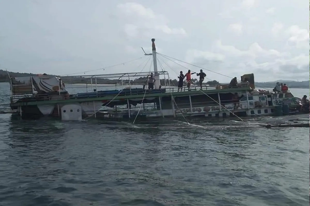 23 passengers, crew rescued from sinking boat off Basilan | ABS-CBN News