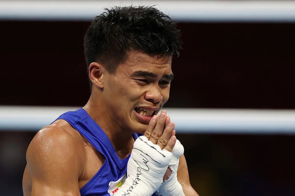From scavenging to Olympic victory: Filipino boxer Carlo Paalam's ...