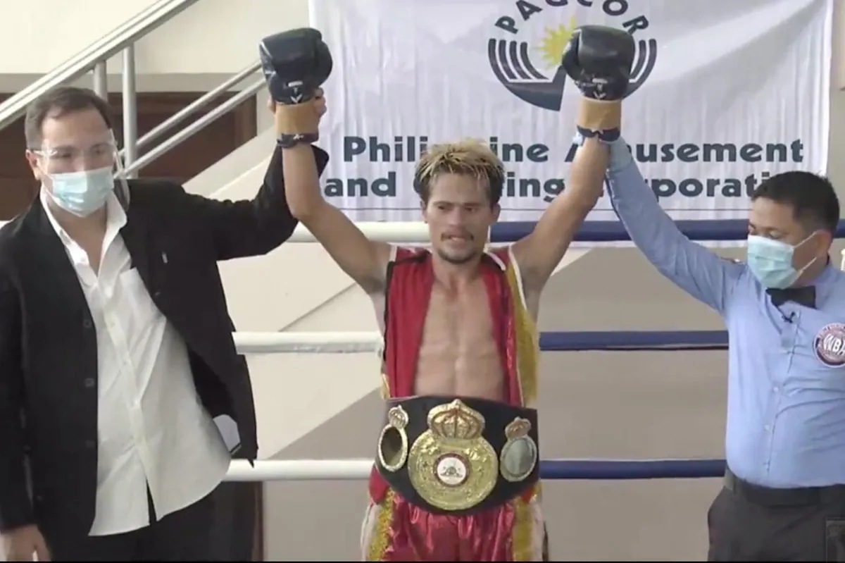 Boxing: Vic Saludar victorious in all-Filipino bout, crowned world ...