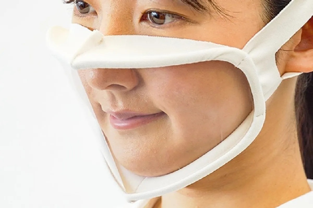 LOOK: Japan company unveils see-through face masks to aid the deaf ...