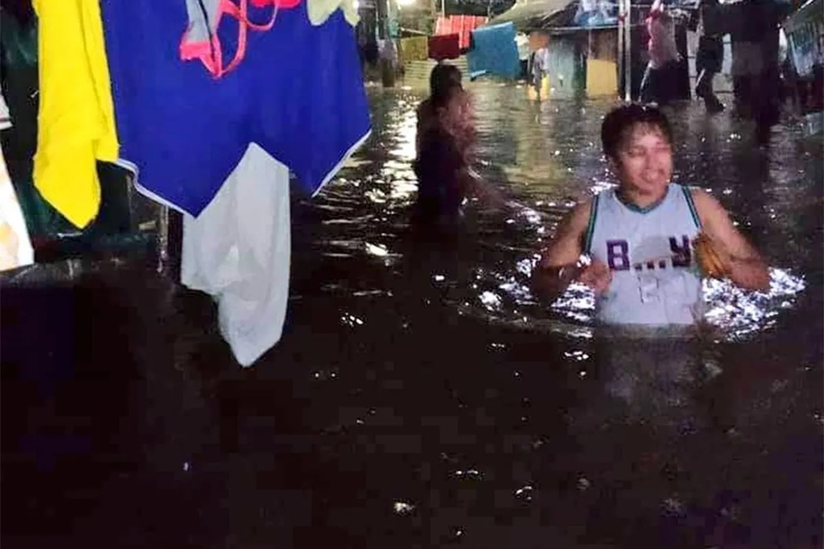 Hundreds evacuated in Lucena due to flooding | ABS-CBN News