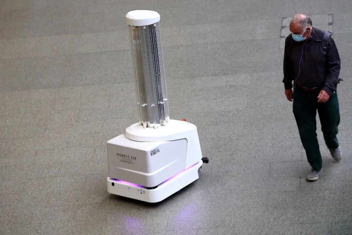 Robots target coronavirus with ultraviolet light at London train ...