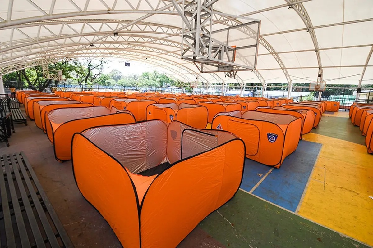 DOH reminds 1 meter distancing, separate tents per family in evacuation ...