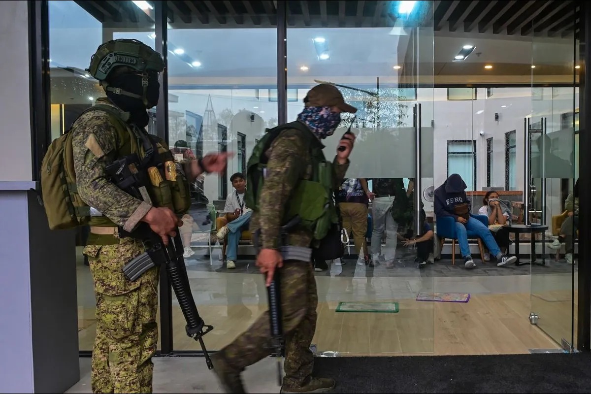 IN PHOTOS: Authorities raid alleged scam hub in Bataan | ABS-CBN News