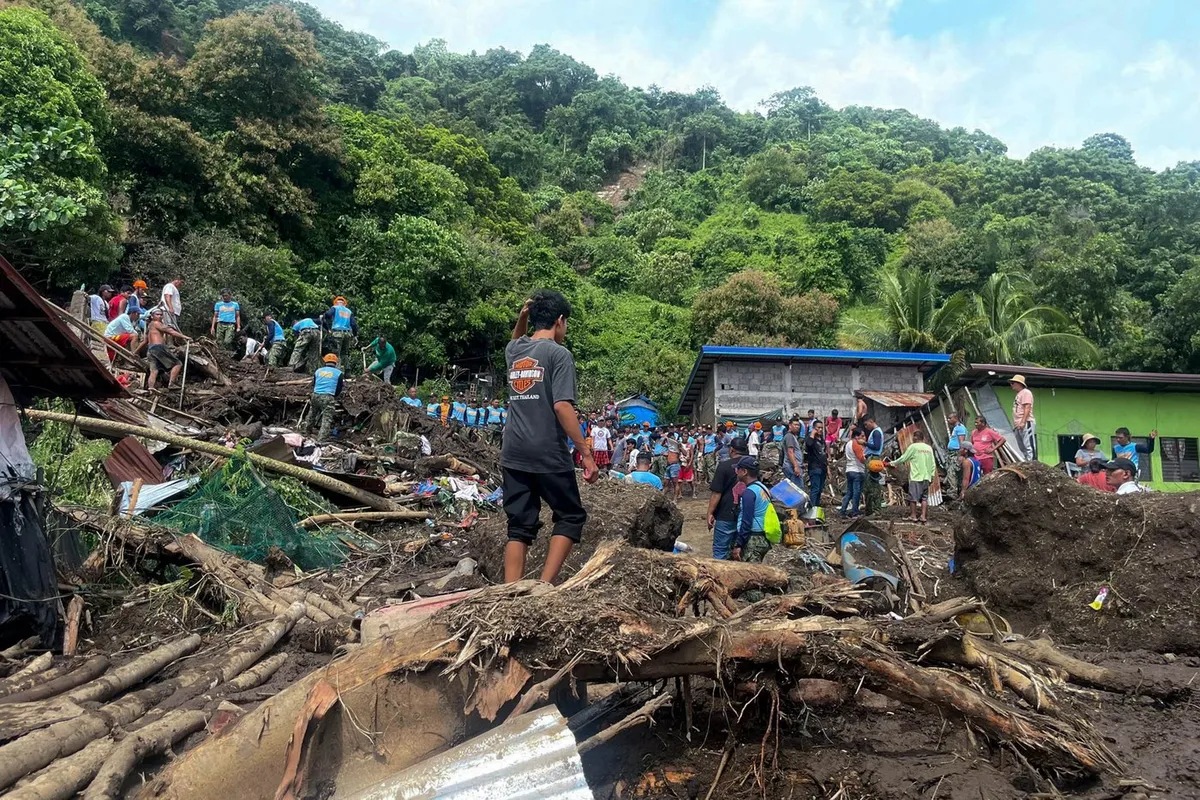 PHOTOS: Landslide buries Batangas village | ABS-CBN News