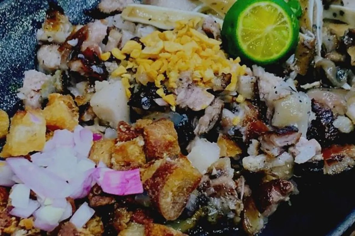 Chef JP Anglo’s new three-way sisig is our current definition of living ...