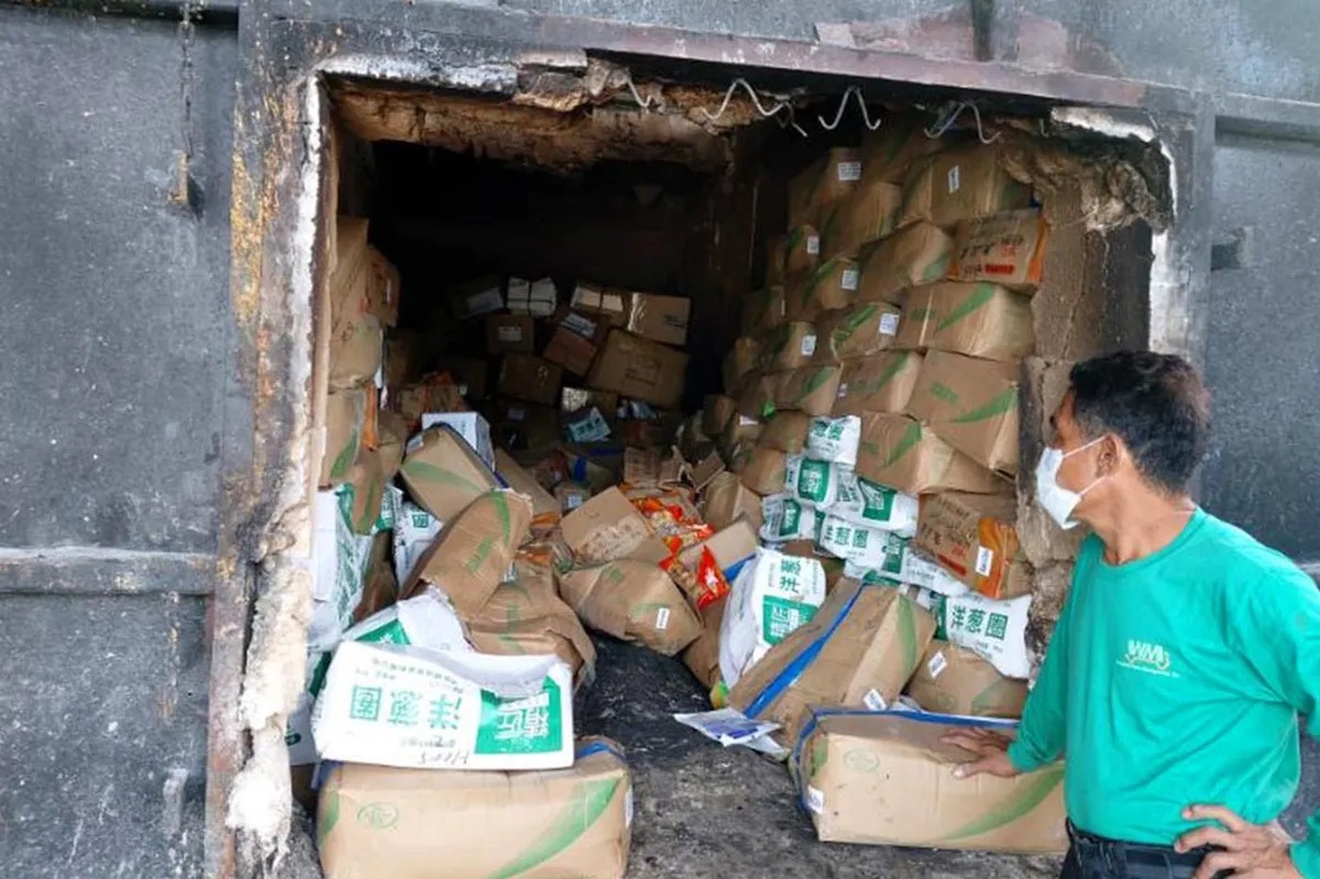 Customs, animal industry officials dispose of China food products with ...