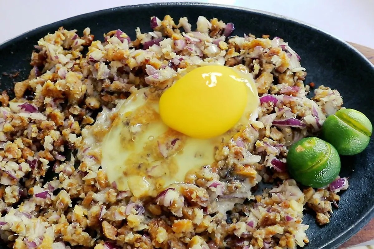 VIDEO: JJ Yulo treks through Manila to try 5 of the best sisig in the ...