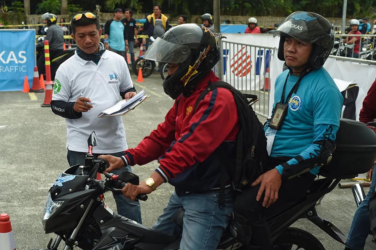 'Angkas' to customers: Don't book rides during heavy rains | ABS-CBN News