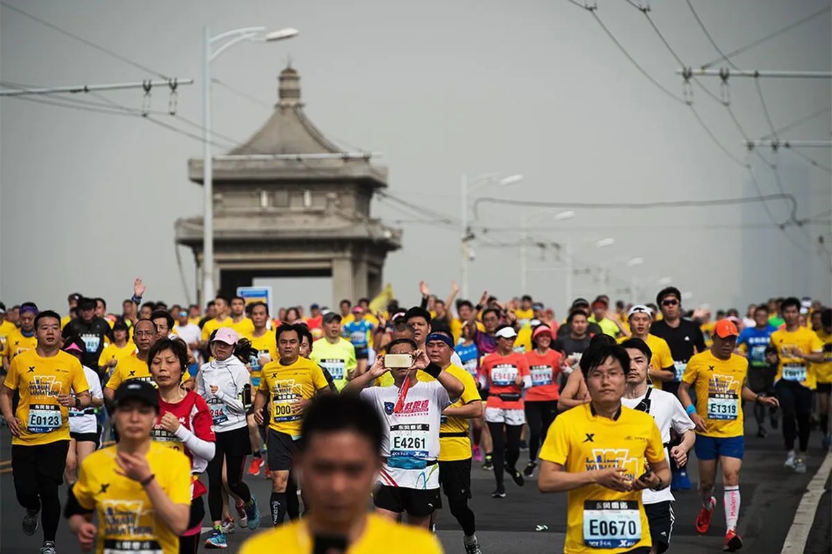 Bikes, shortcuts, bibs for cash: China marathon cheats run rampant | ABS-CBN
