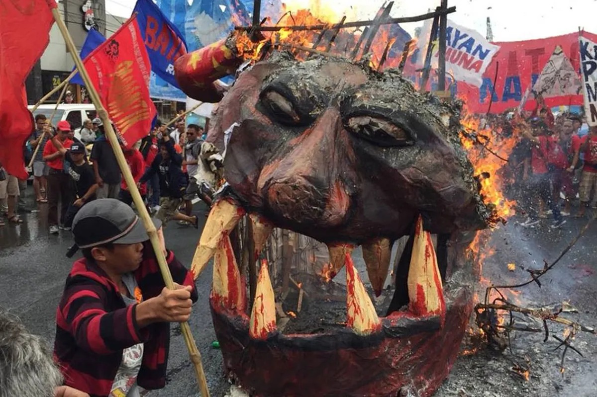'Duterte-monyo': Protesters parade effigies depicting Duterte as evil ...