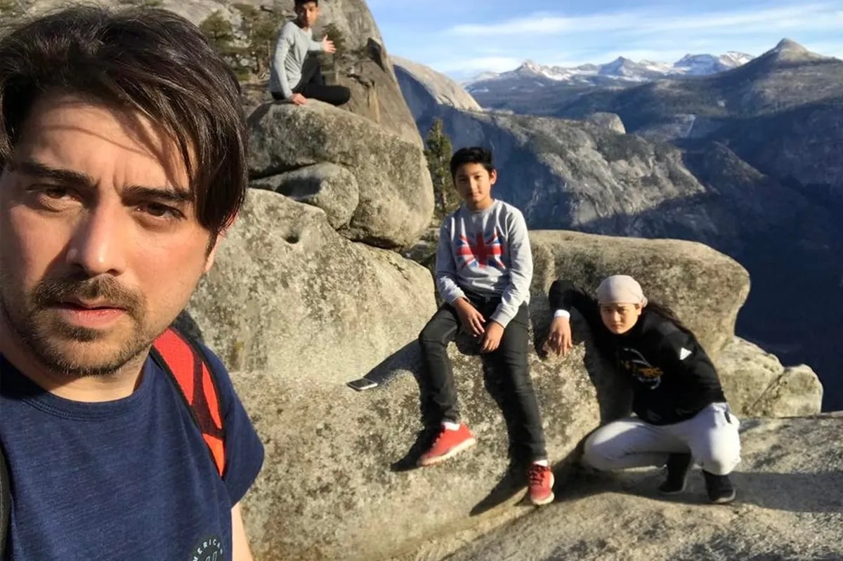 LOOK: Ian Veneracion enjoys 2,425-foot waterfall hike with kids | ABS ...