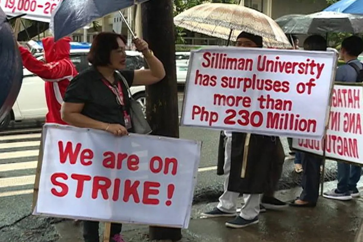 Silliman faculty launch labor strike amid collapse in CBA talks | ABS ...