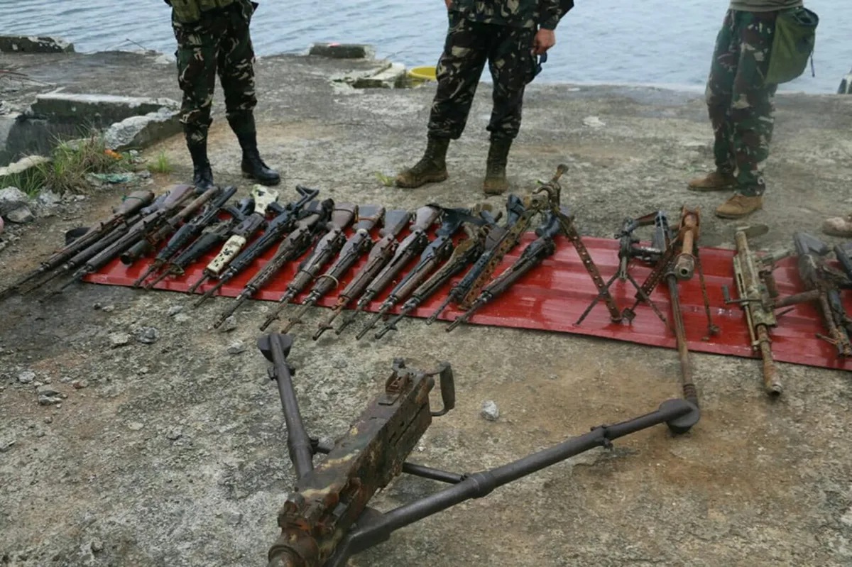 High-powered firearms recovered underwater in Marawi City | ABS-CBN News
