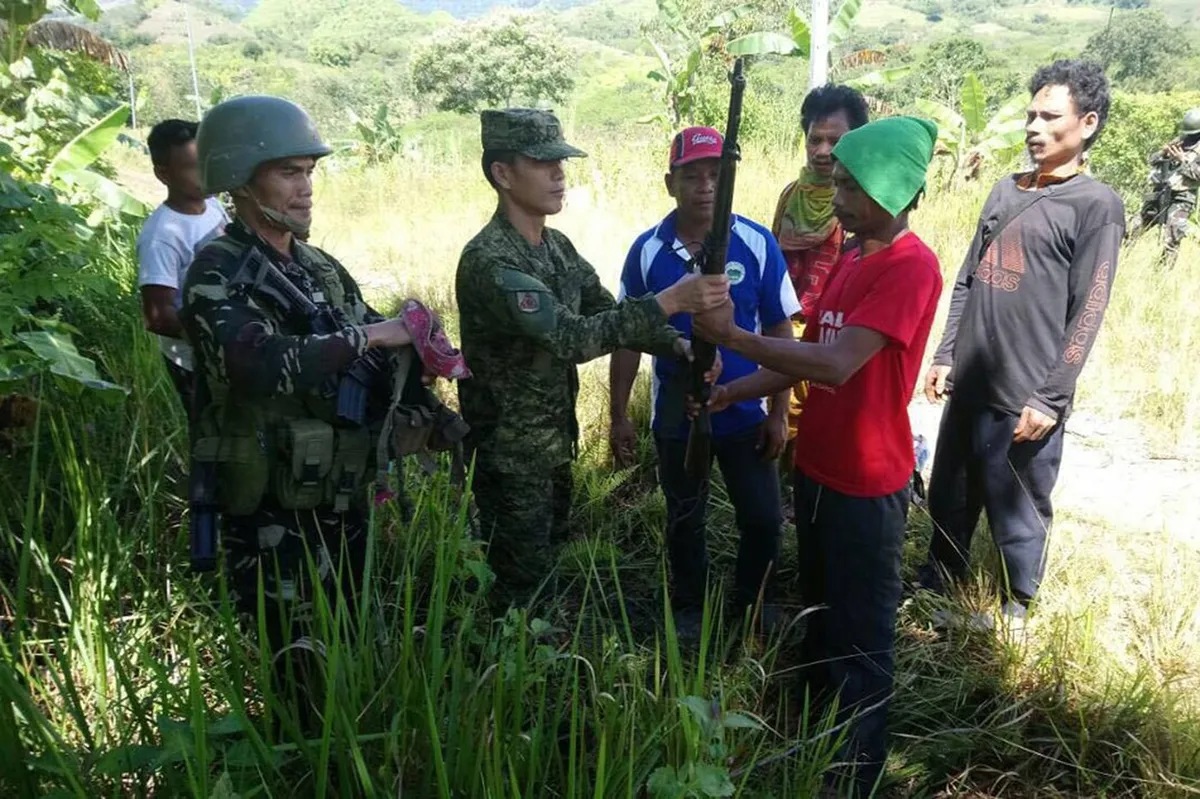 Family of NPA rebels surrender in Sultan Kudarat | ABS-CBN News