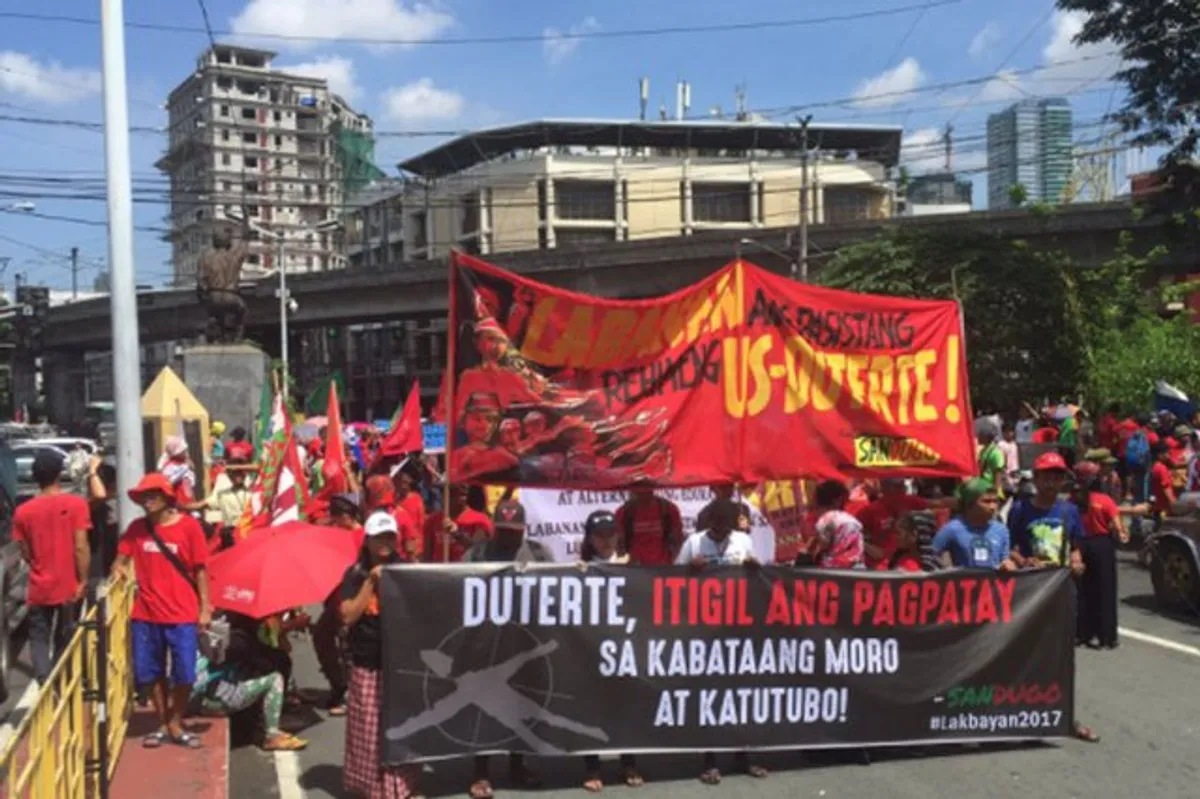 Indigenous, youth groups protest drug war deaths | ABS-CBN News