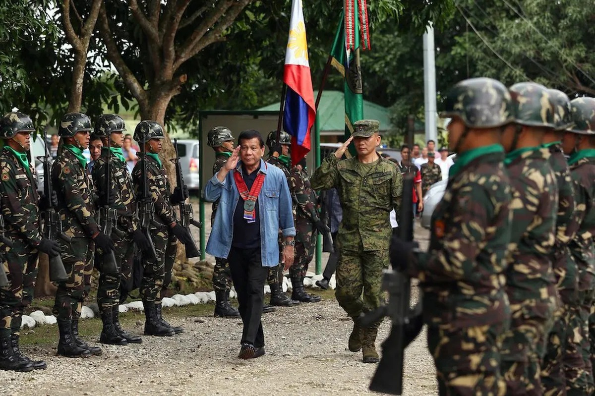 Duterte gives medals to cops wounded in NPA ambush | ABS-CBN News