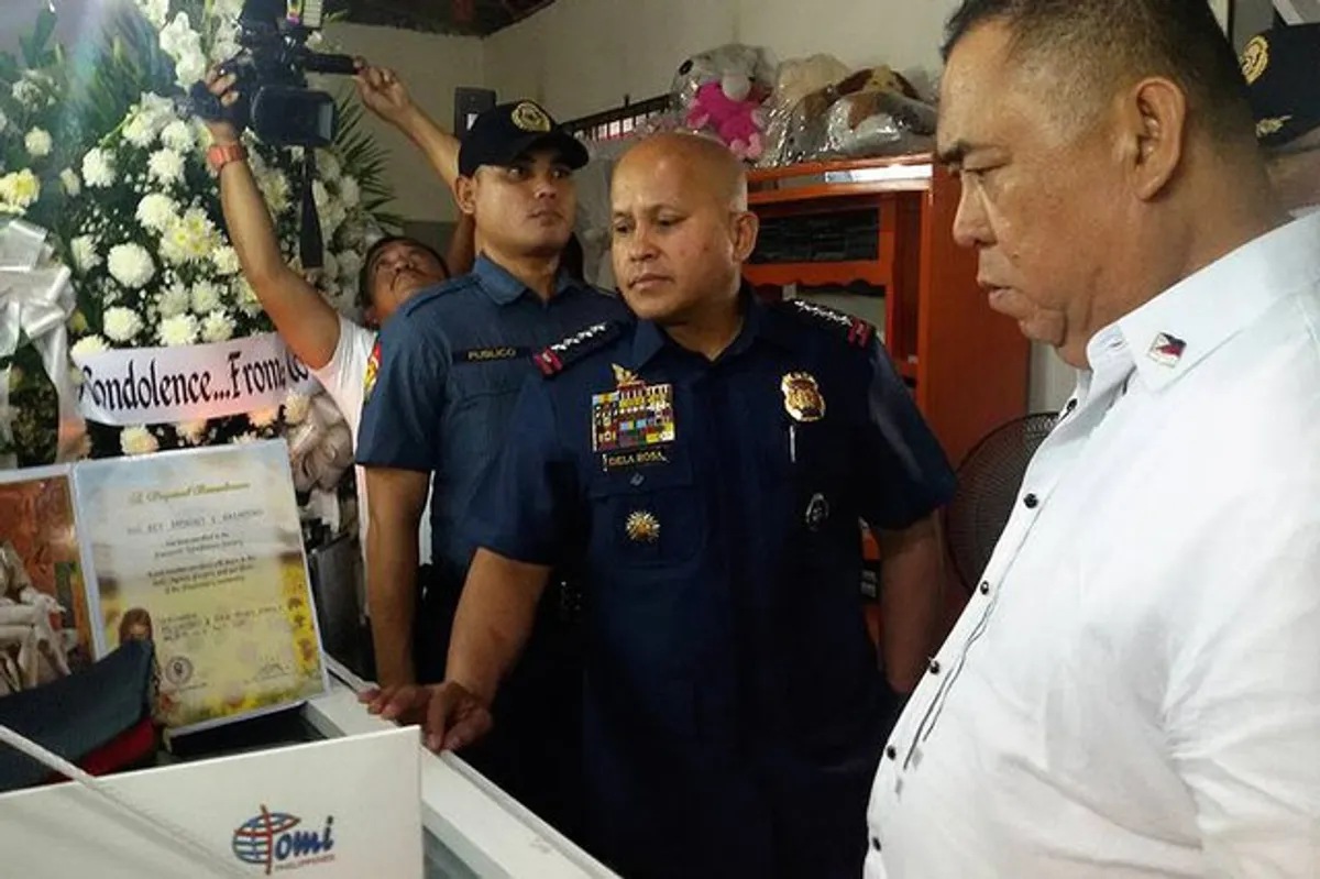 Dela Rosa visits wake of cop slain in Inabanga clash | ABS-CBN News