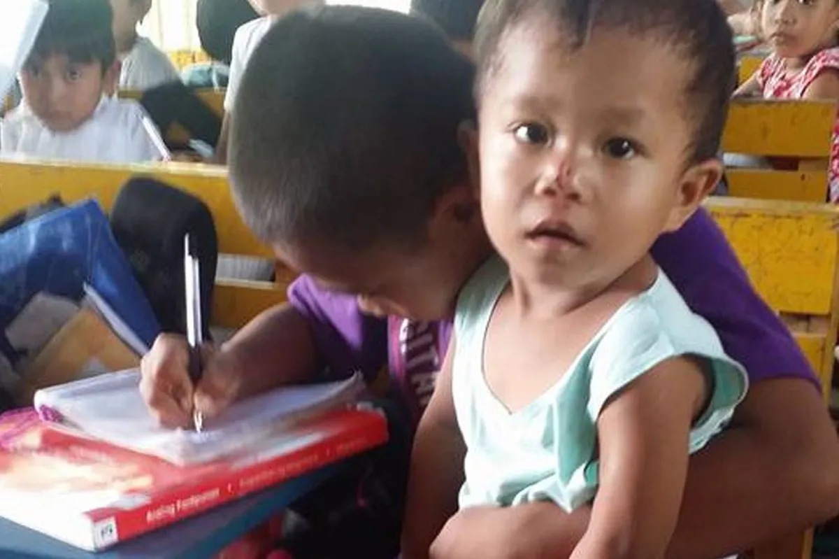 VIRAL: Studious boy brings baby brother to school | ABS-CBN