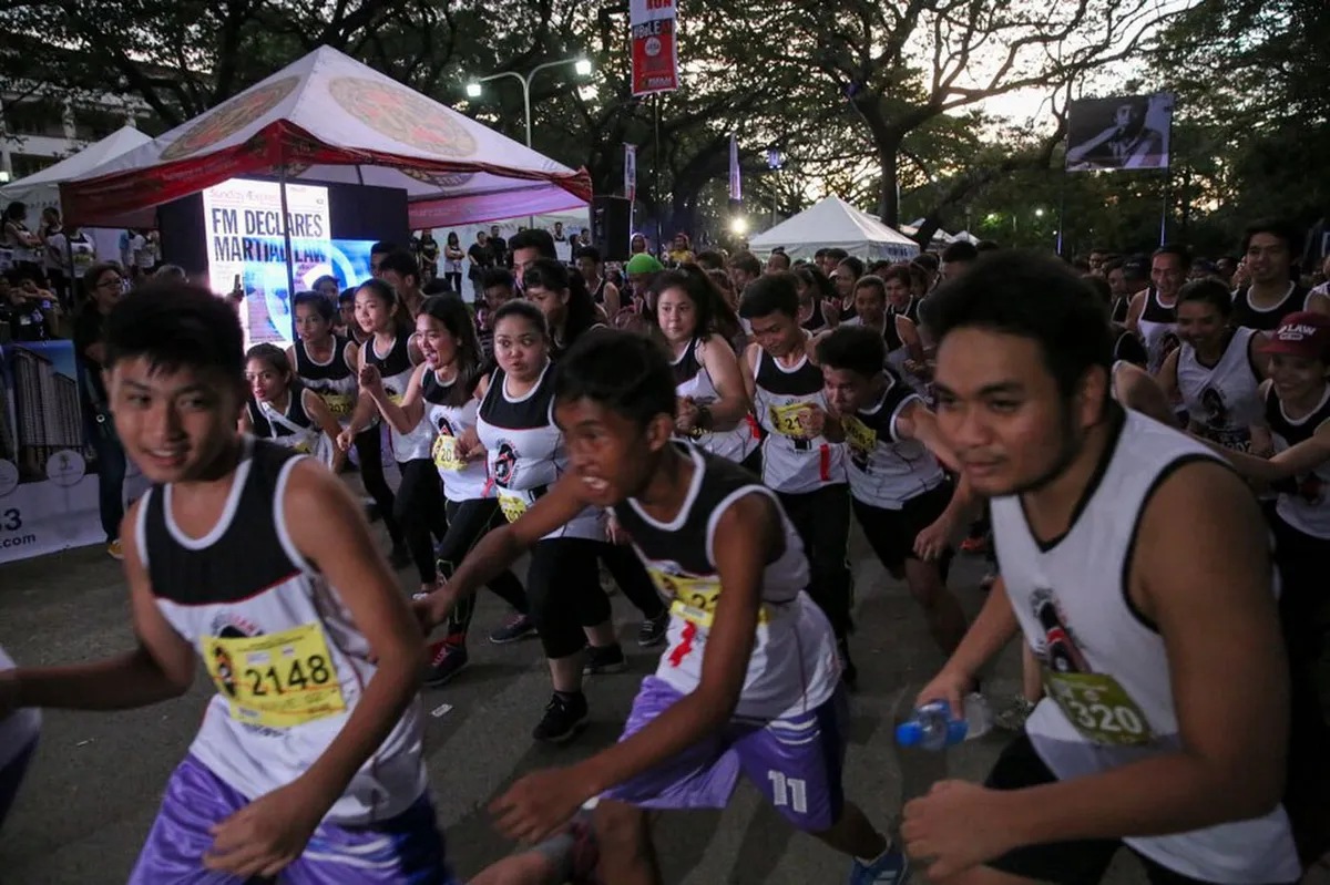 Participants of the Great Lean Run pay tribute to slain student, real ...