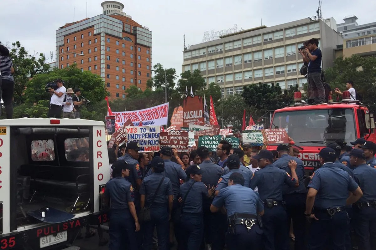 WATCH: Police car runs over protesters after US embassy scuffle | ABS ...