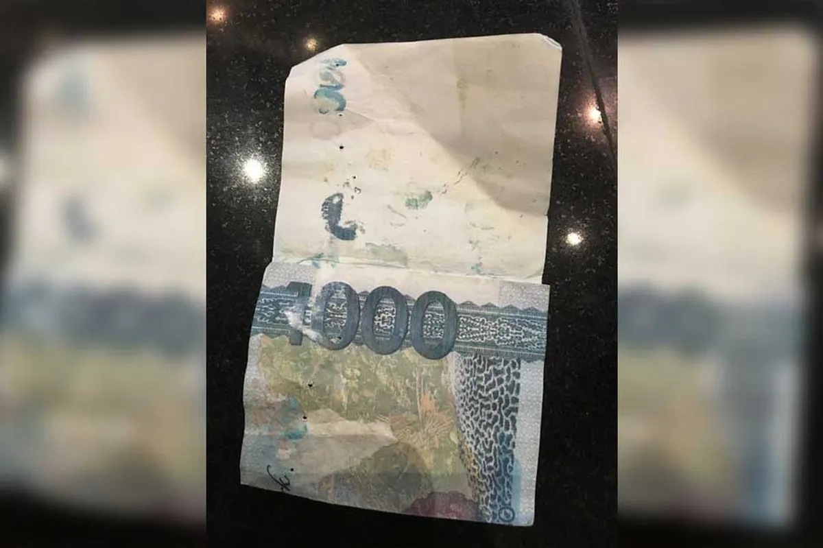 LOOK: Fake P1,000 used to scam burger joint in BGC | ABS-CBN News