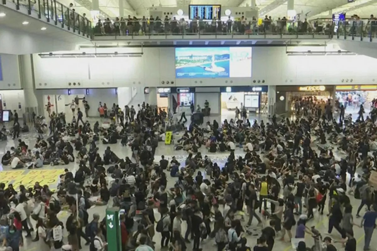 Protesta sa Hong Kong airport di nakaapekto sa mga Pinoy na pabalik ng ...