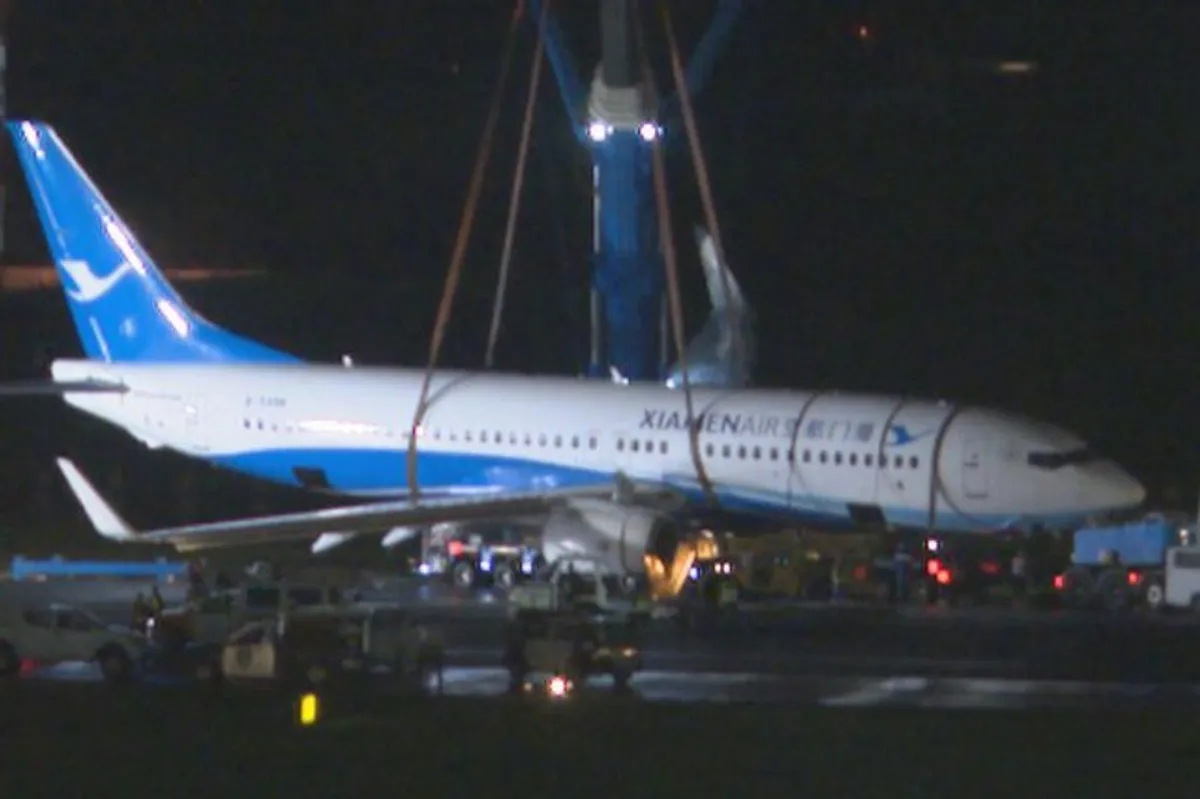 WATCH: How stalled Chinese plane was removed from NAIA runway | ABS-CBN ...