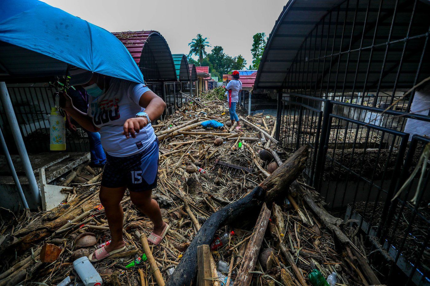 PHOTOS: Mud-covered cemetery in Laurel, Batangas | ABS-CBN News