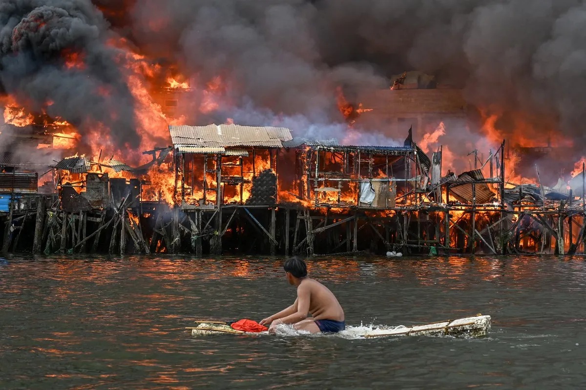 Massive fire leaves 2,000 families homeless in Tondo's Isla Puting Bato ...